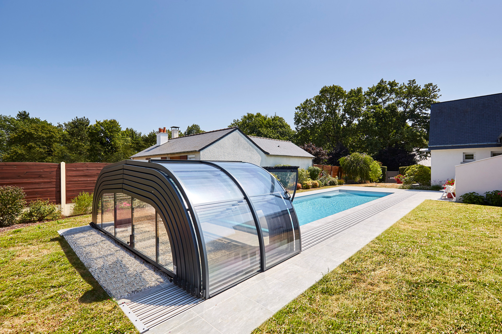 Abri de piscine coulissant télescopique - Gustave Rideau